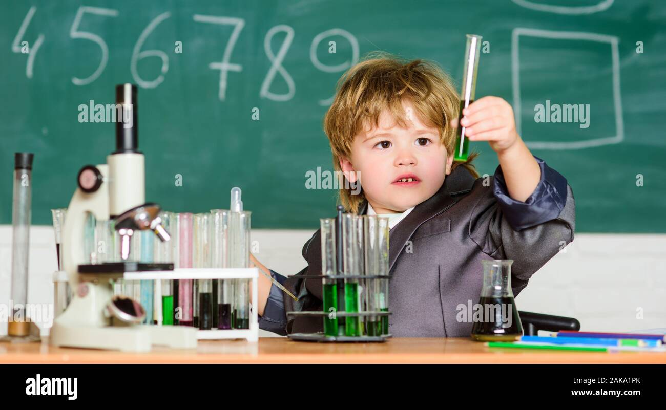 Fascinating subject. Knowledge day. Kid study biology chemistry. Boy ...