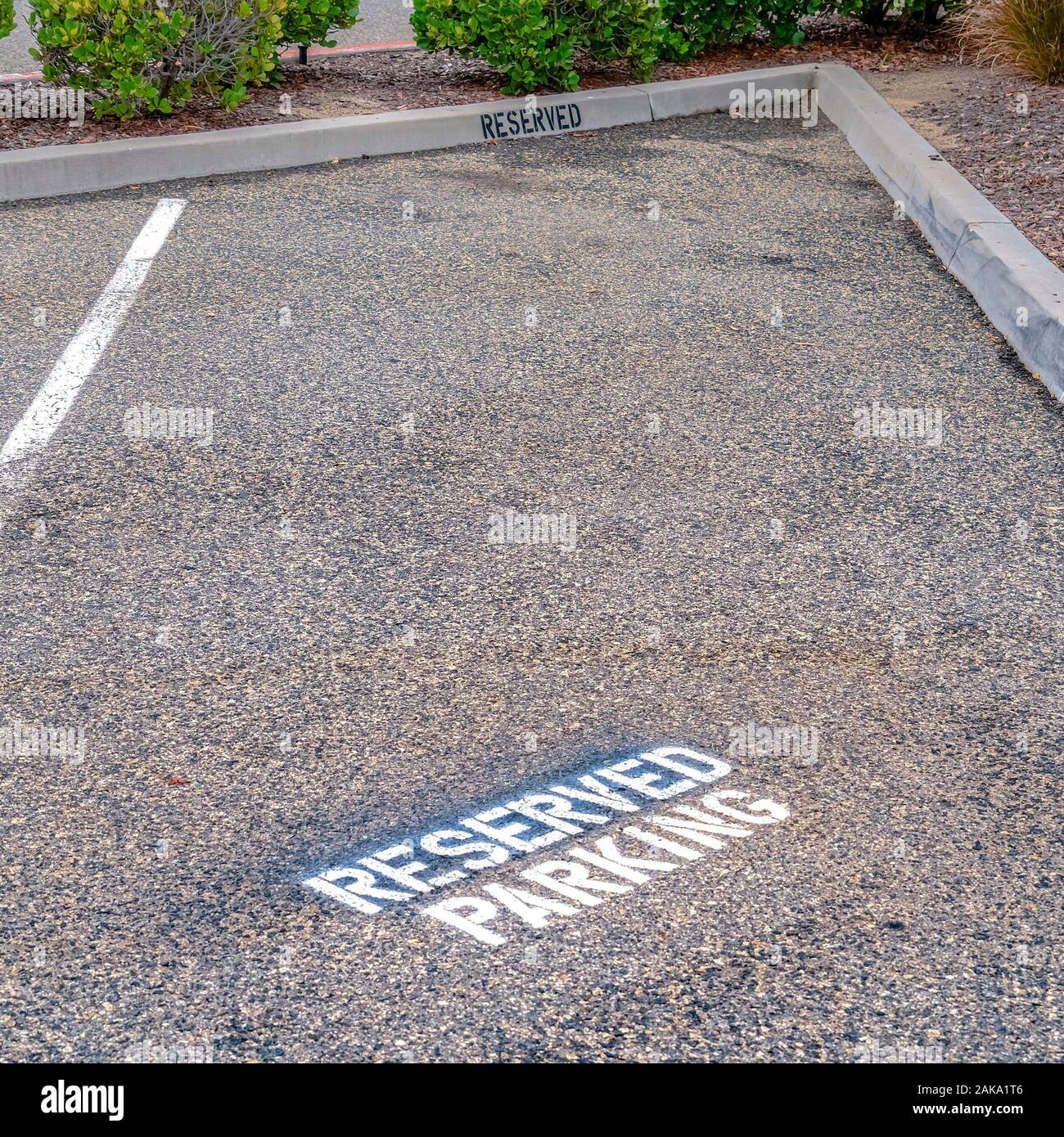 Square Reserved Parking sign on a restricted parking bay Stock Photo ...