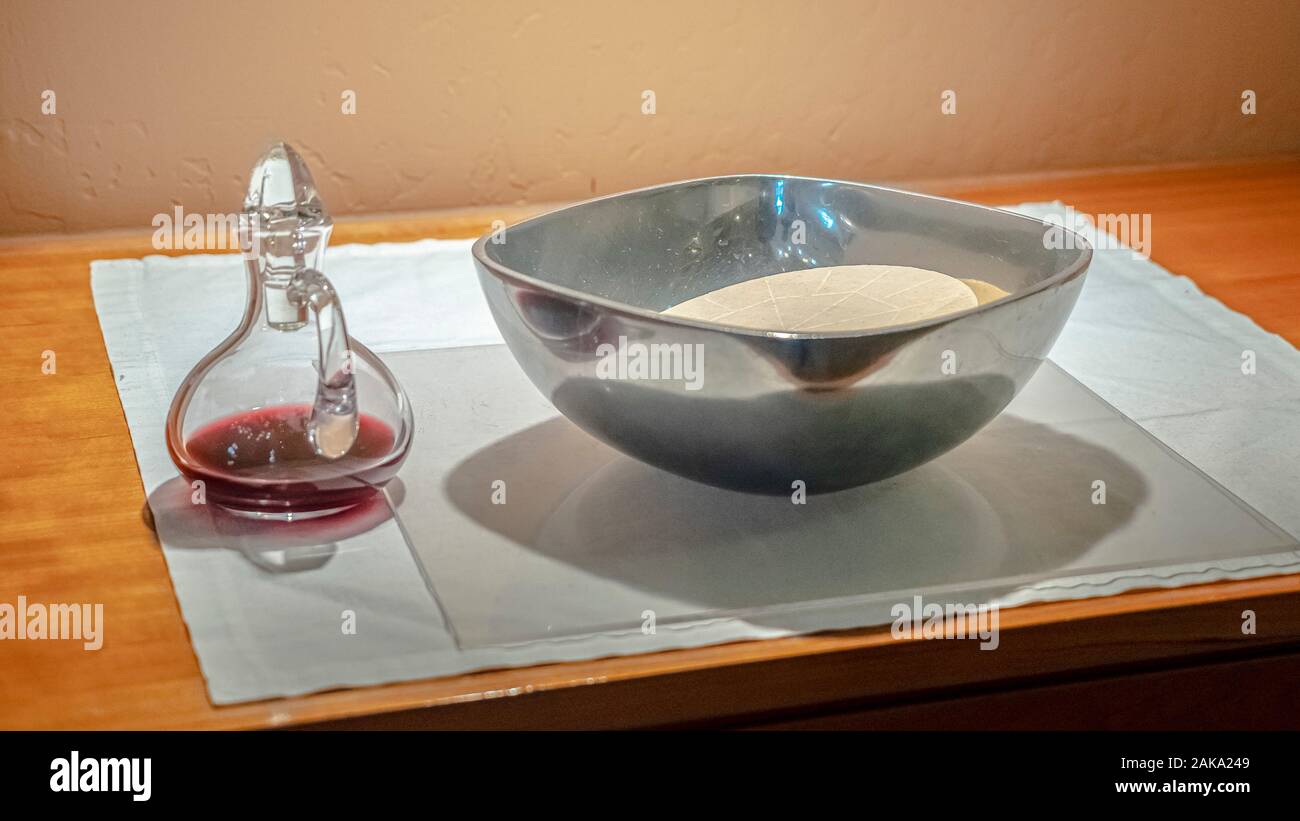 Panorama Holy Communion wine and wafers in a church Stock Photo - Alamy
