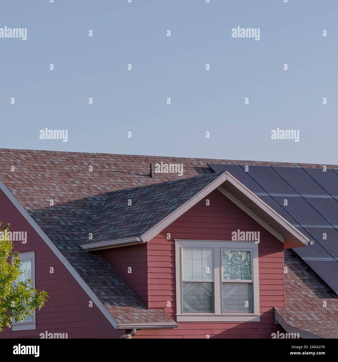 Square frame Array of photovoltaic solar panels on a roof Stock Photo ...