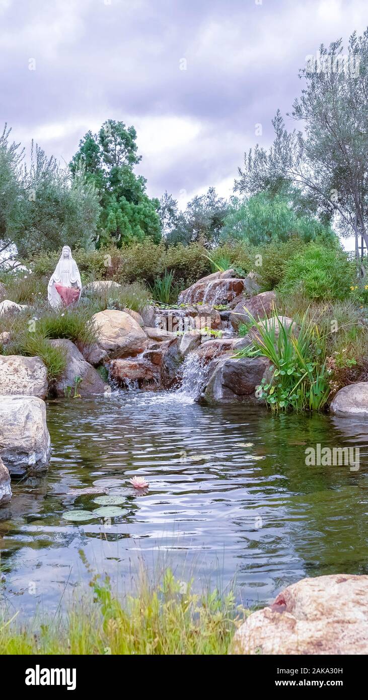 Vertical frame Water feature in a garden or park Stock Photo - Alamy