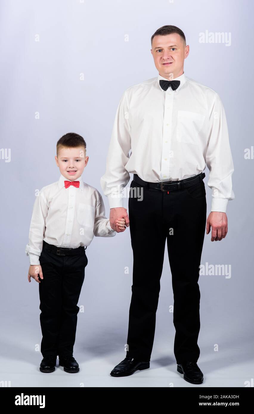 bow tie. male fashion. parenting. fathers day. happy child with father ...