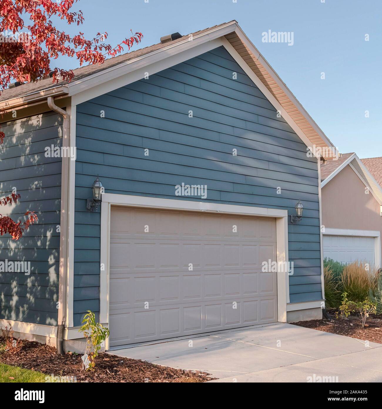 Square frame Close double timber clad garage for cars Stock Photo - Alamy