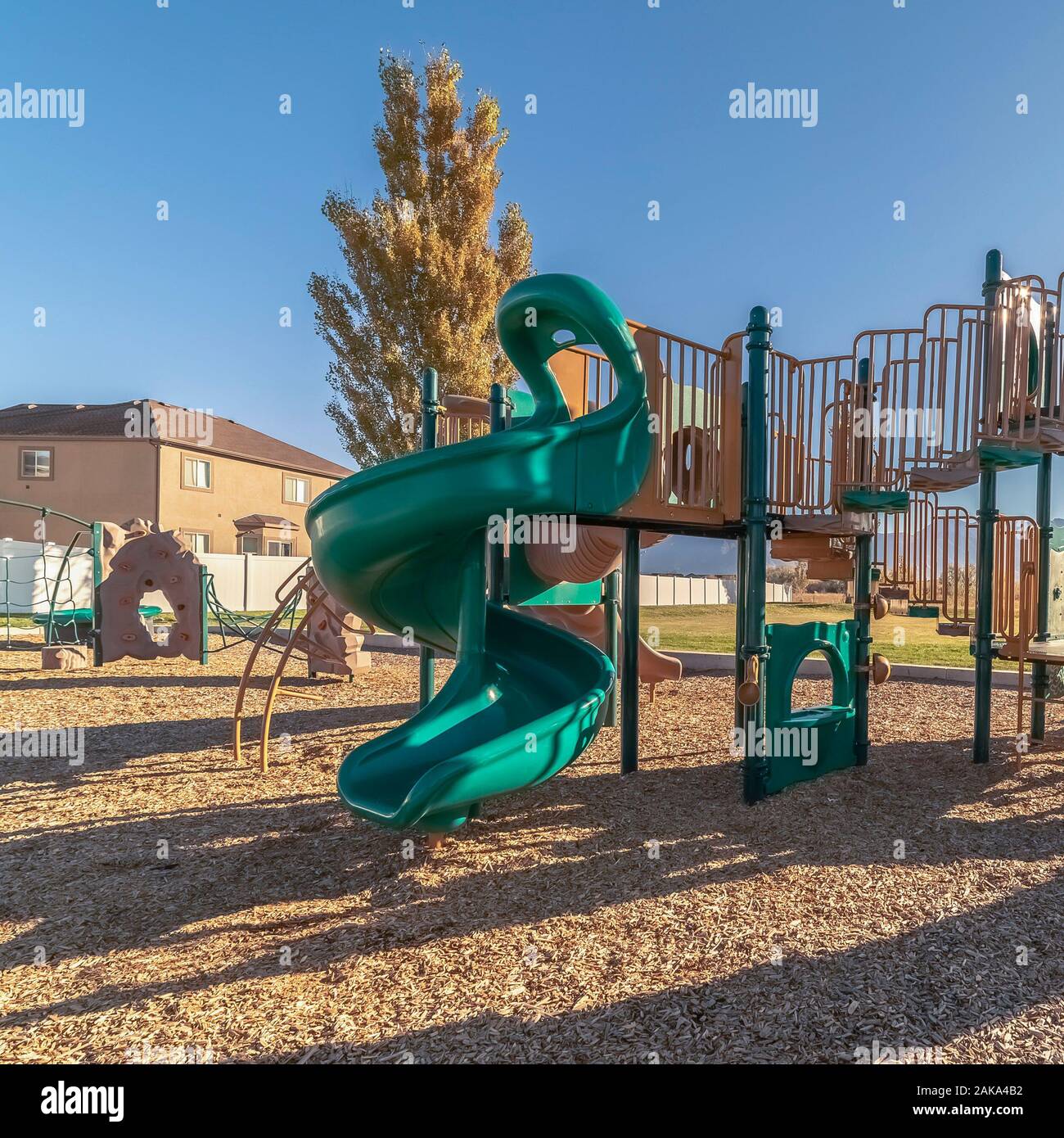 Square Assorted shapes of slides in a kids playground Stock Photo - Alamy