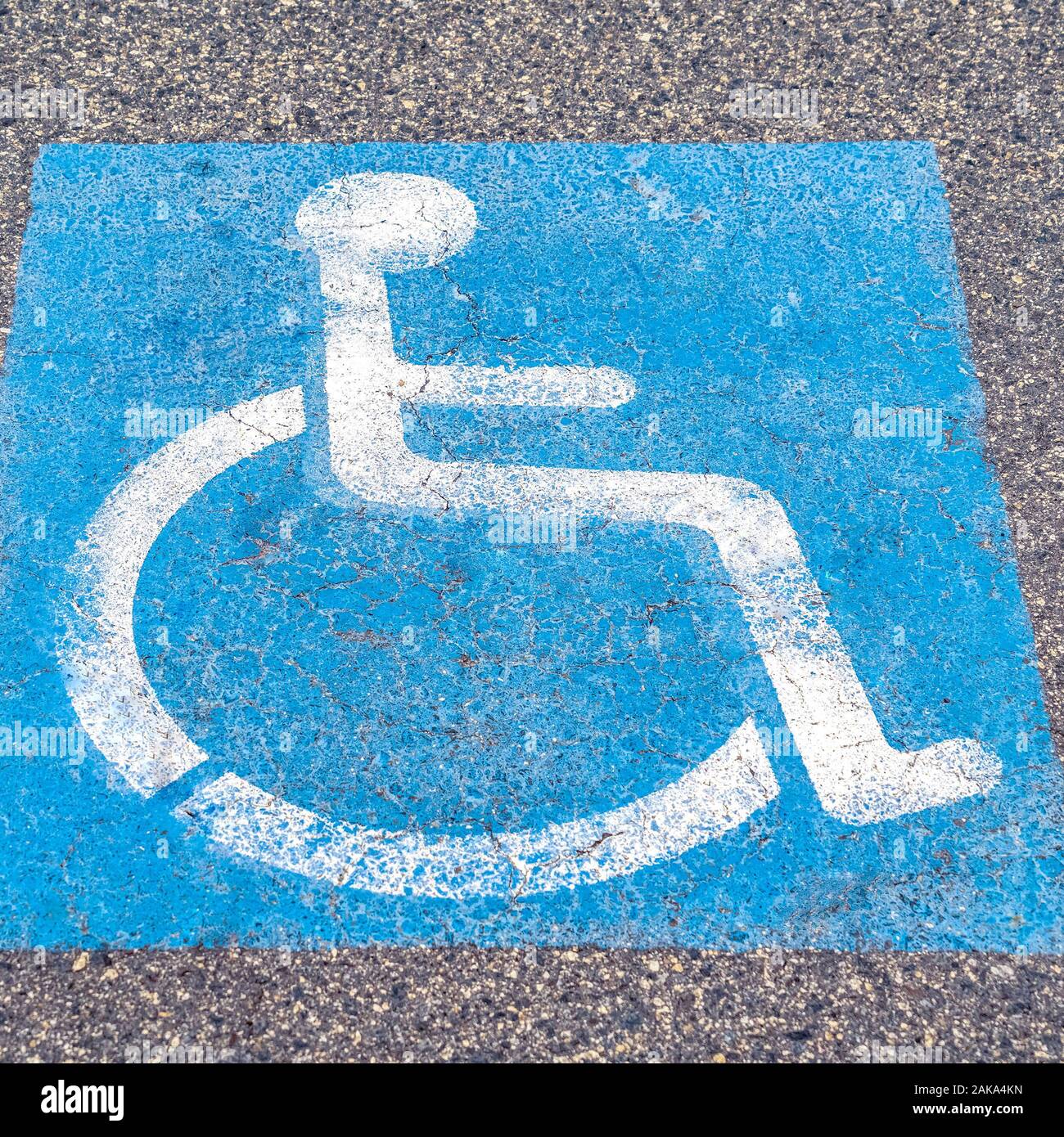 Square Disabled or Handicapped road sign on asphalt Stock Photo - Alamy