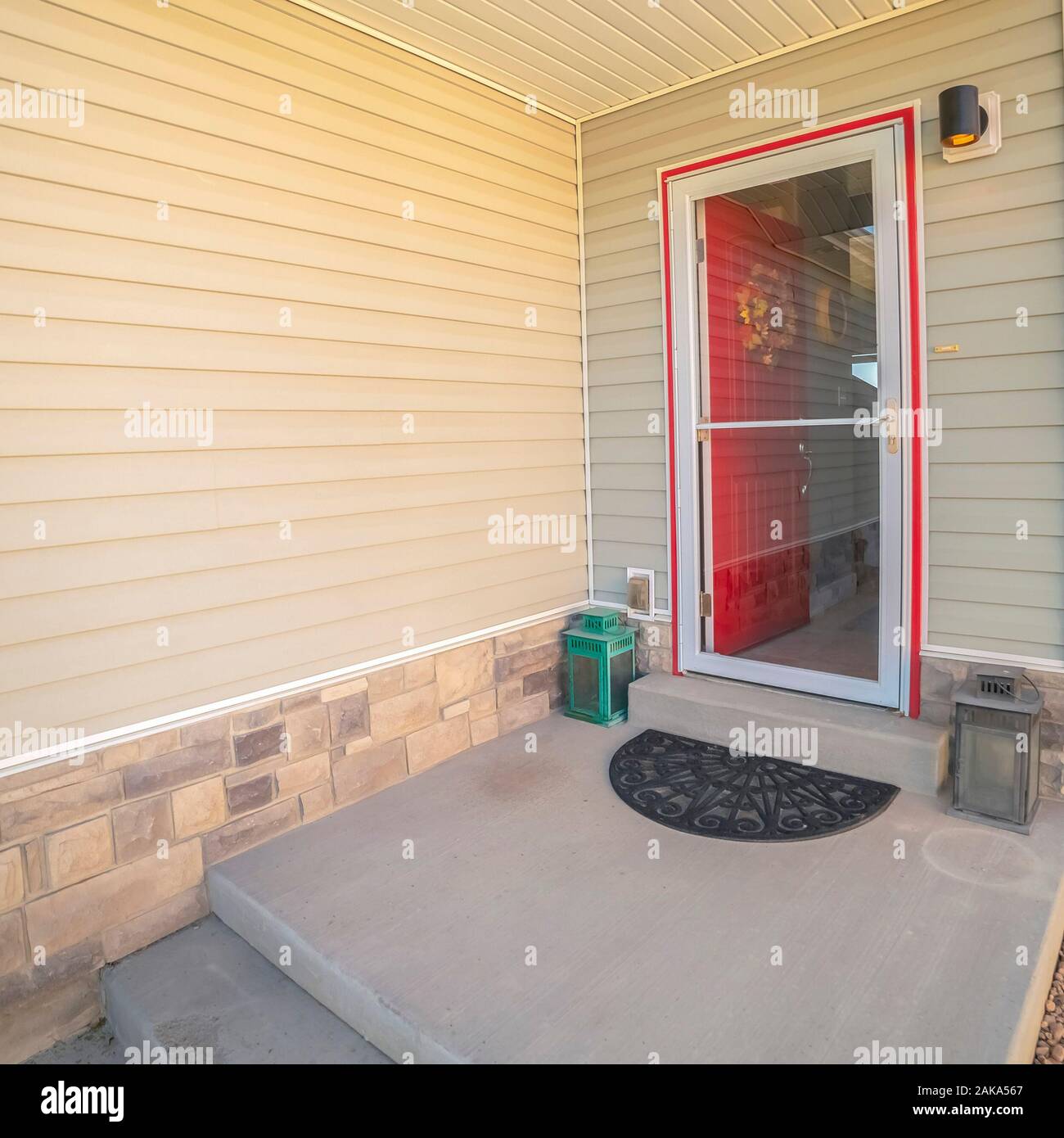 Square frame Glass entrance door to a timber house Stock Photo - Alamy