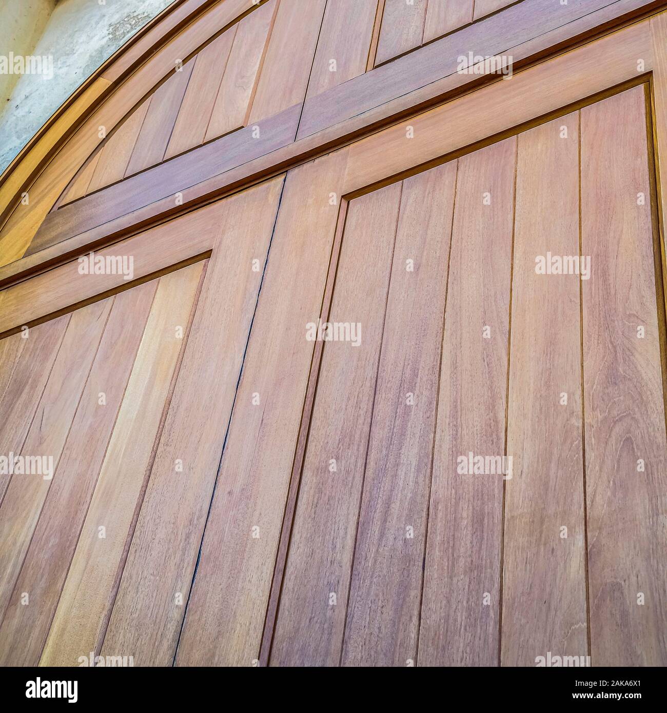 Square frame Natural wood double arched closed door exterior Stock ...