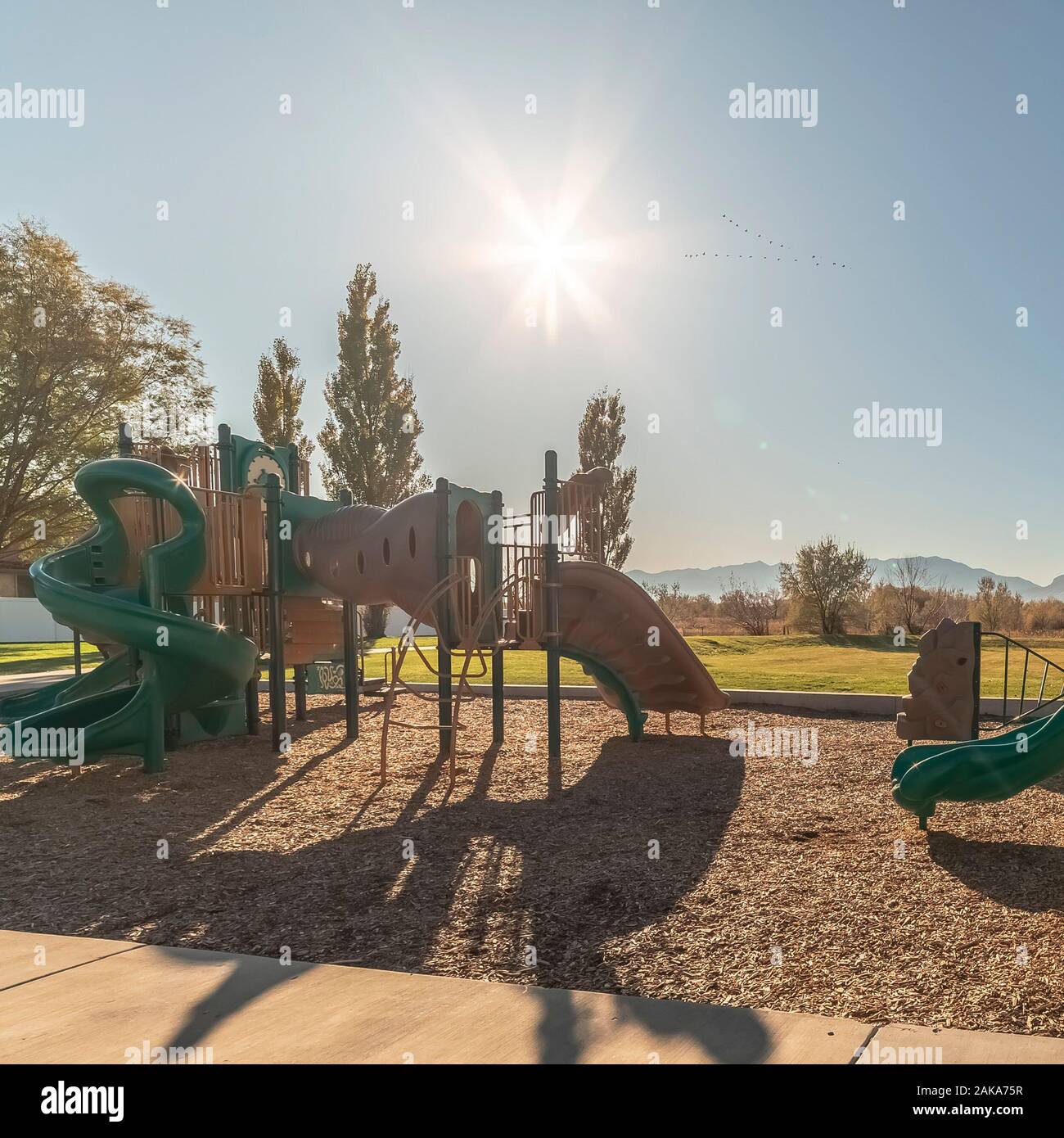 Square Colourful equipment in a kids playground outdoors Stock Photo ...