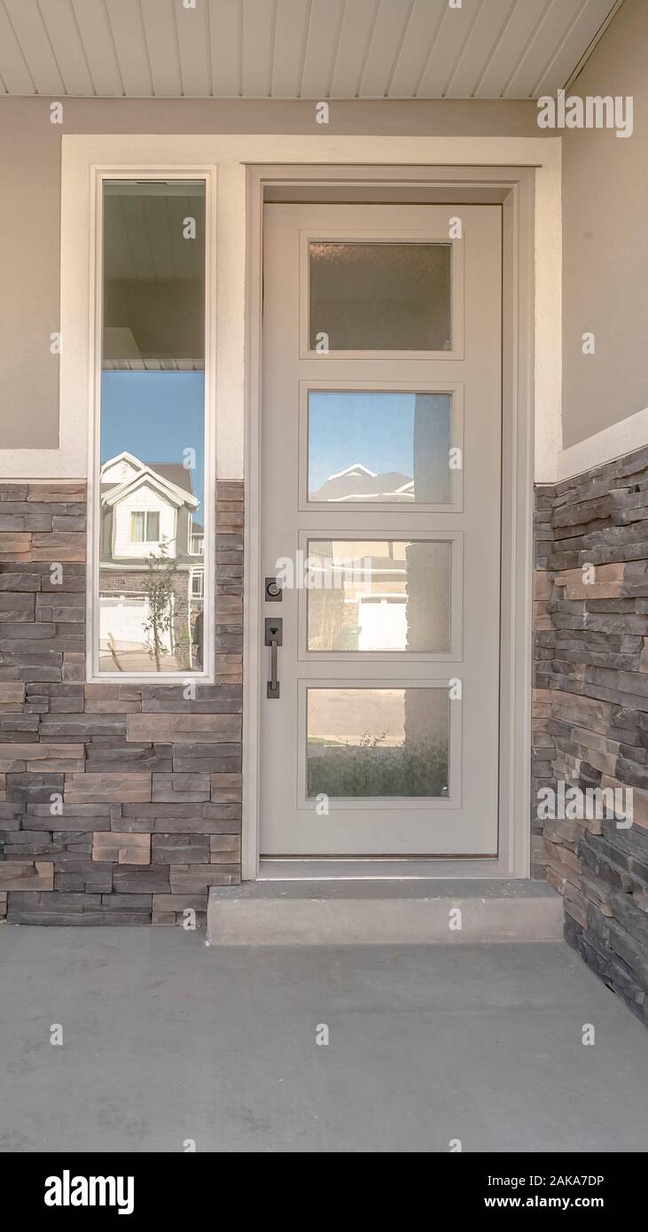 Vertical Glass entrance door to a modern home Stock Photo - Alamy