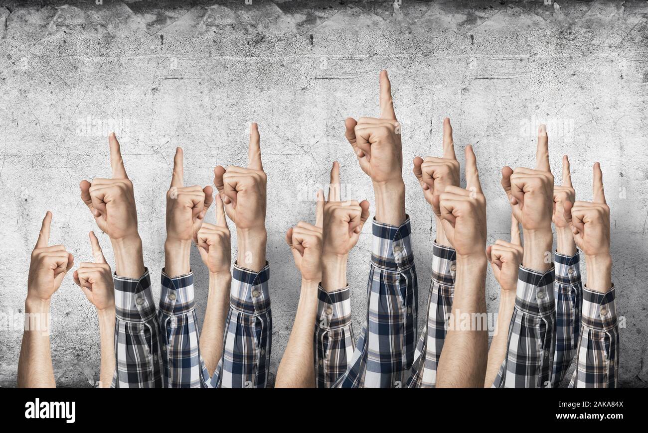 Row of man hands showing finger pointing gesture Stock Photo - Alamy