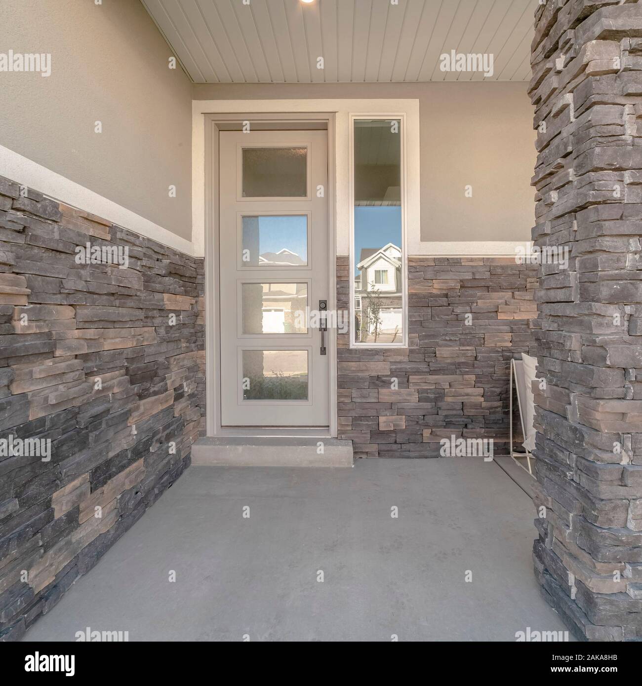 Square frame Glass entrance door to a modern home Stock Photo - Alamy