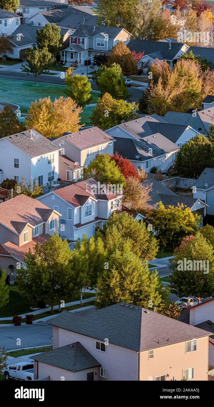 Vertical Modern urban housing estate with small park Stock Photo - Alamy