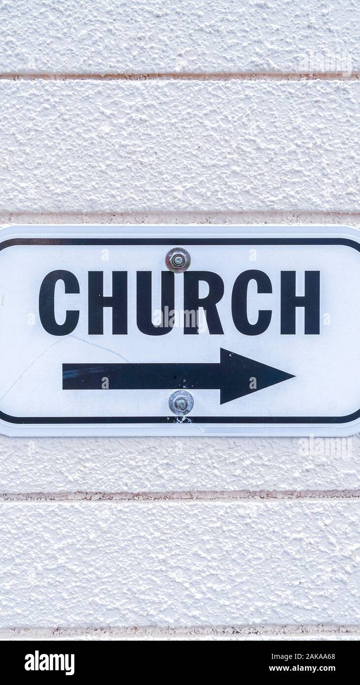 Vertical frame Church sign with arrow pointing to the right Stock Photo ...