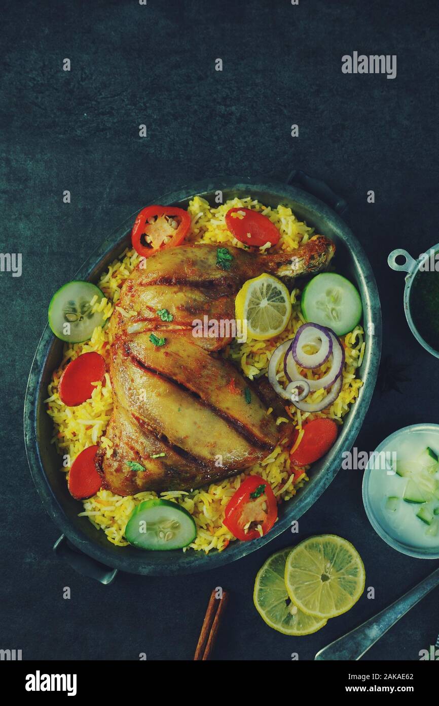 Chicken Kabsa/ kuzhi Mandhi or Mandi Biryani served with yogurt mint ...