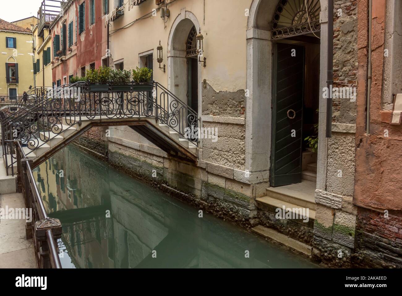 View of canal in Venice with small bridge. Architecture and landmarks ...