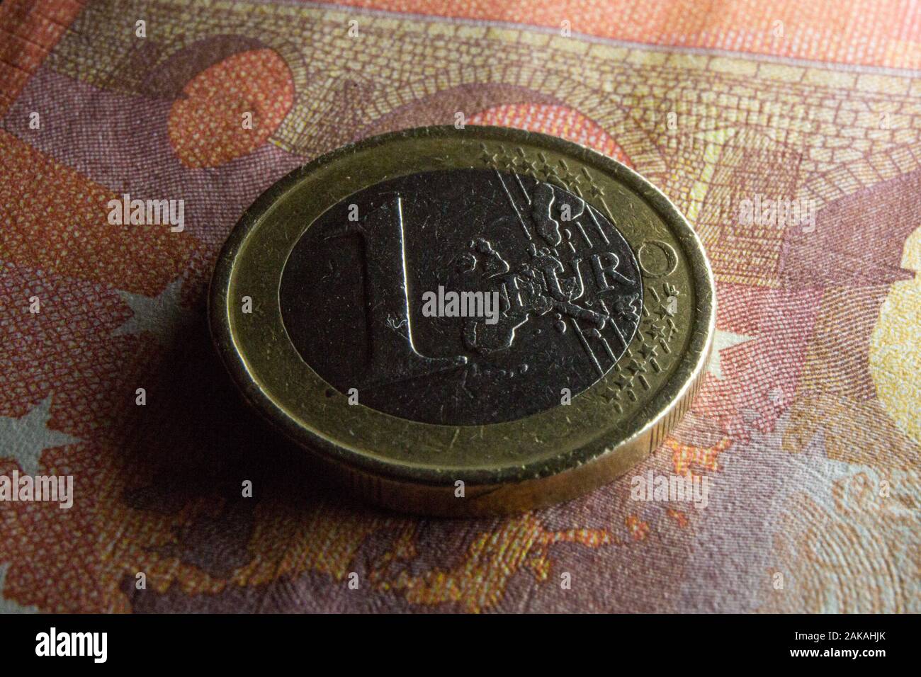 Poland. 3rd Jan, 2020. In this photo illustration a one euro coin seen ...