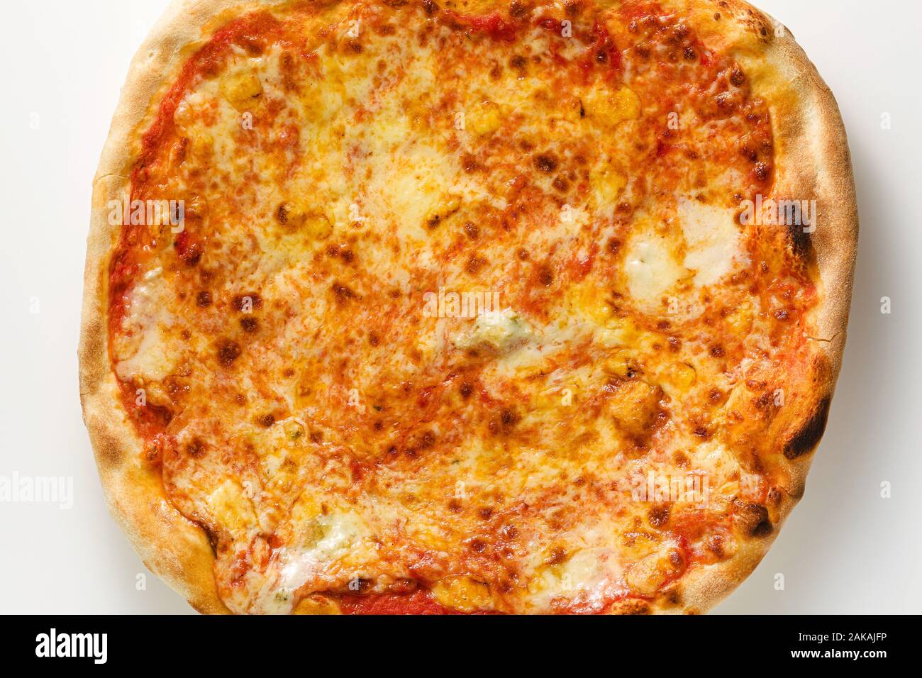 large italian pizza isolated on white table Stock Photo - Alamy
