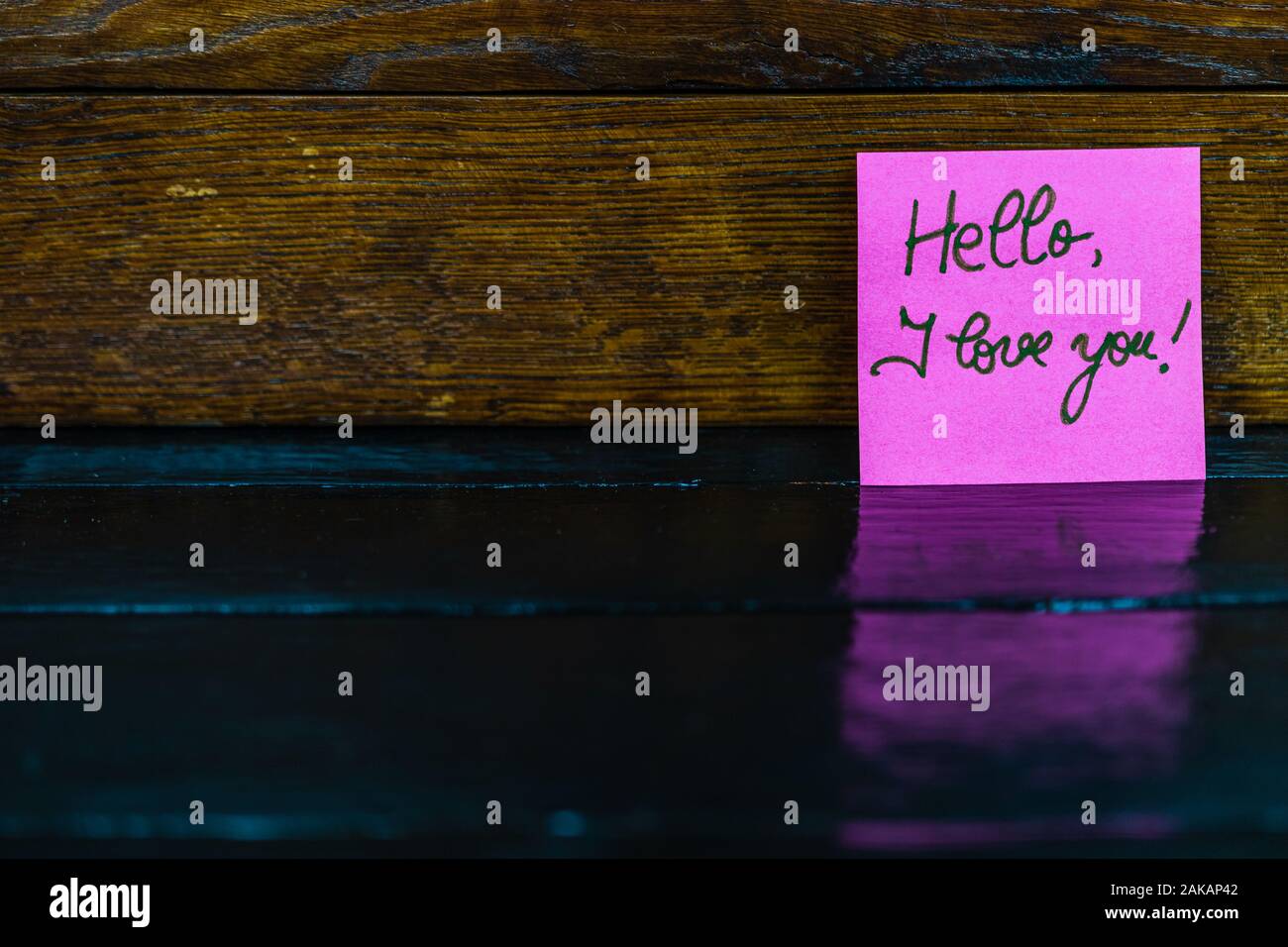 Text Hello, I love you on post it. Writing on sticky note. Bucharest ...