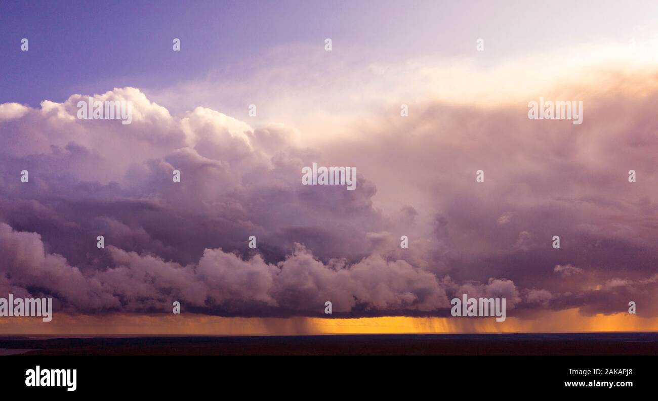 Aerial image of dark Storm clouds over the land. Aerial panorama of ...