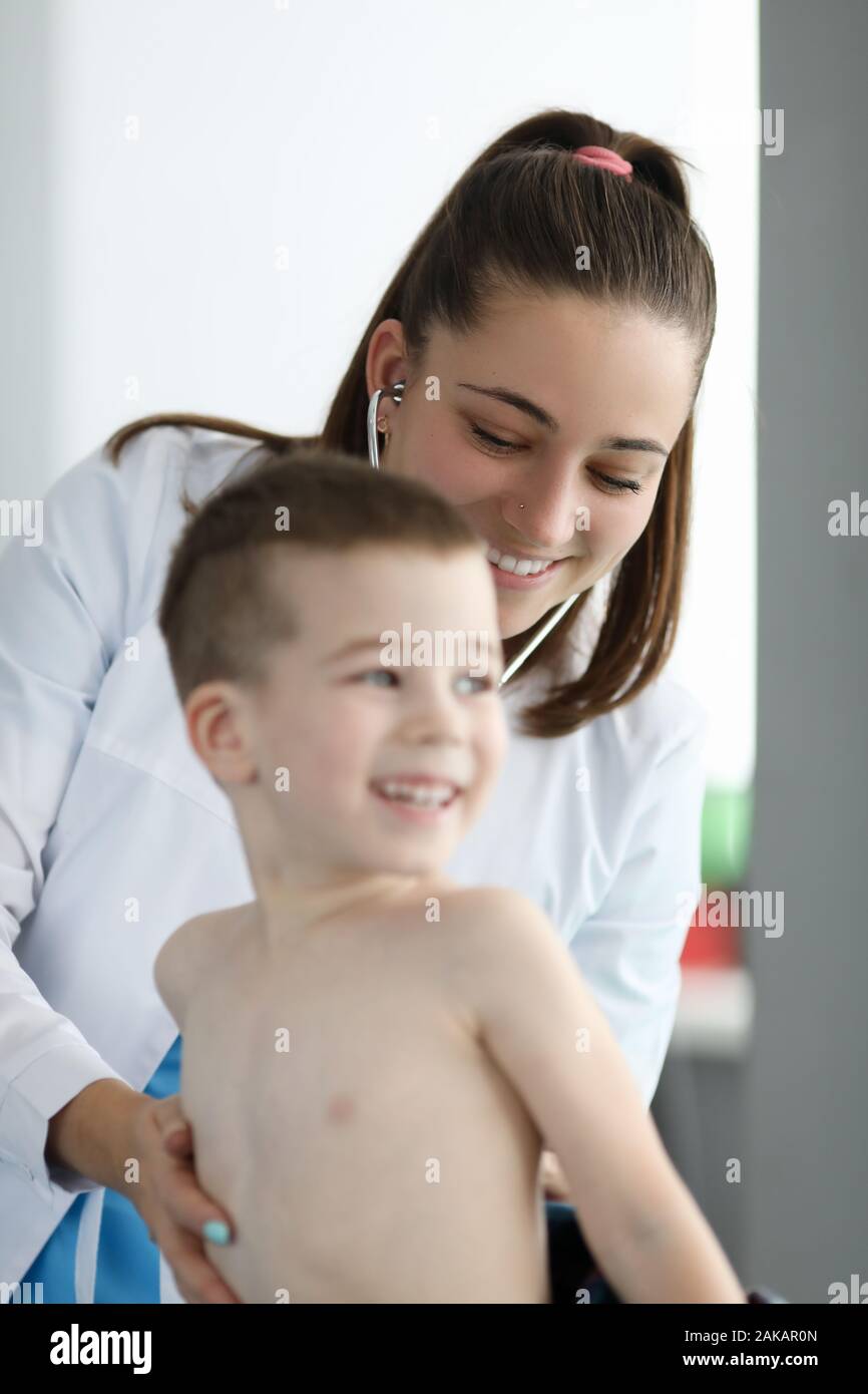 Family doctor and kid Stock Photo - Alamy