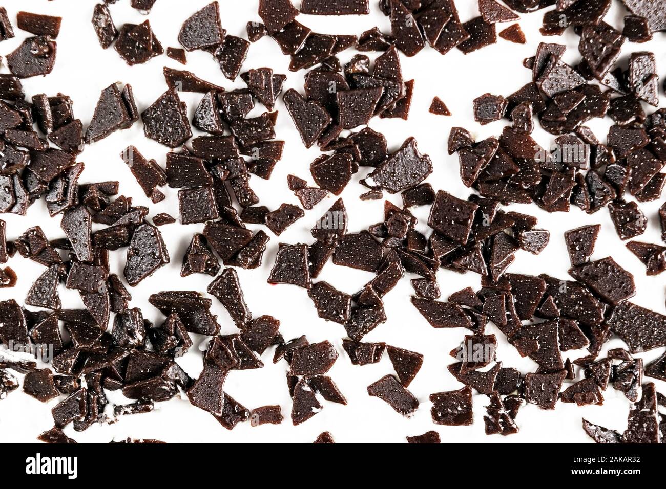 Grated chocolate. Pile of ground chocolate isolated on white background ...