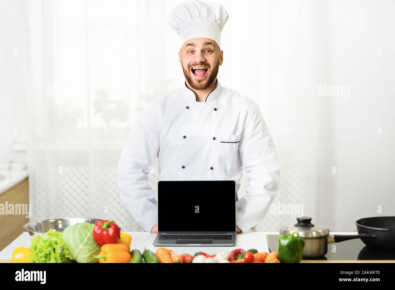 Excited Male Chef Showing Laptop Computer Empty Screen Cooking Standing ...