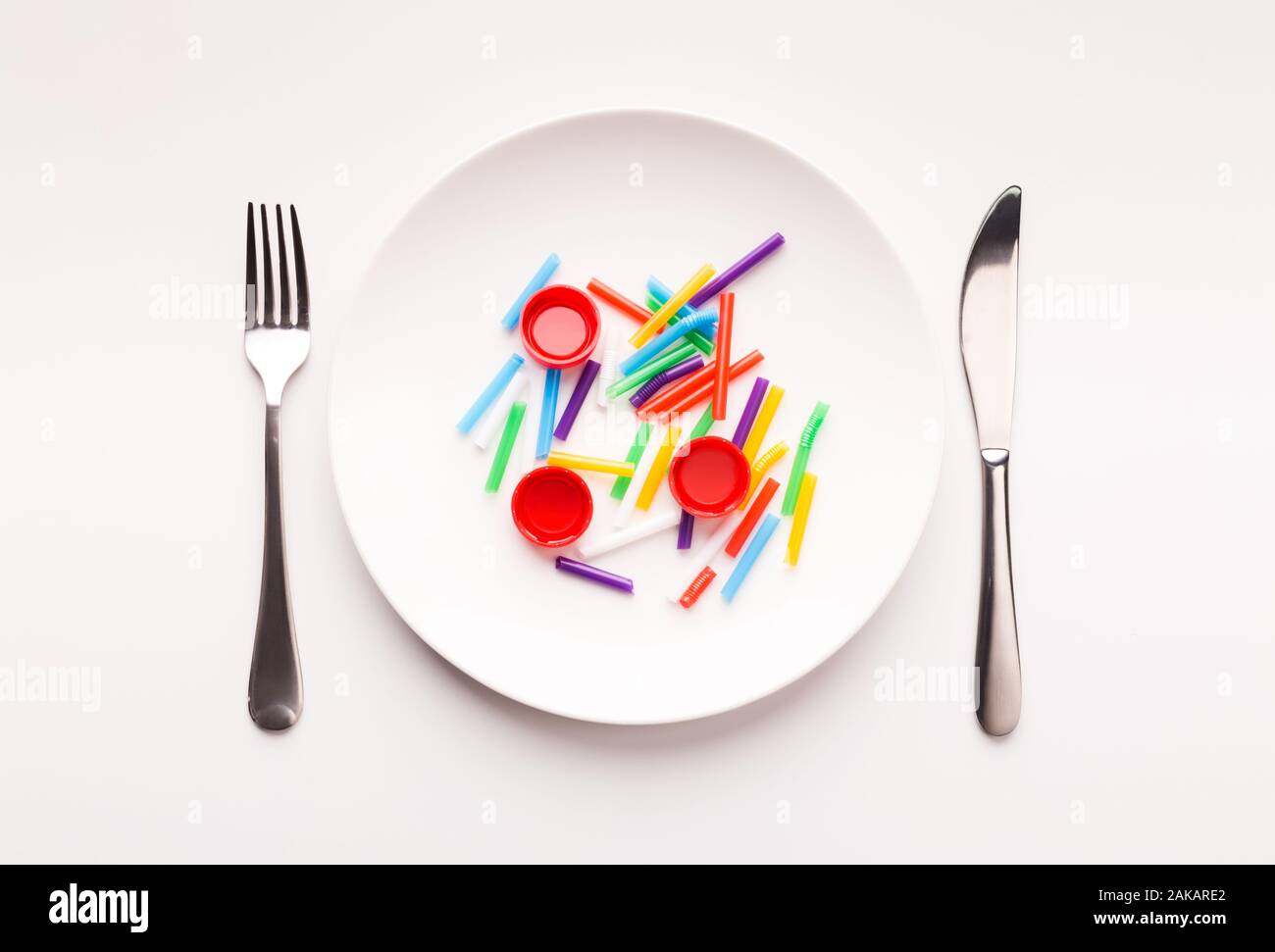 Plastic pollution of food concept. Plastic waste ready to eat on a ...