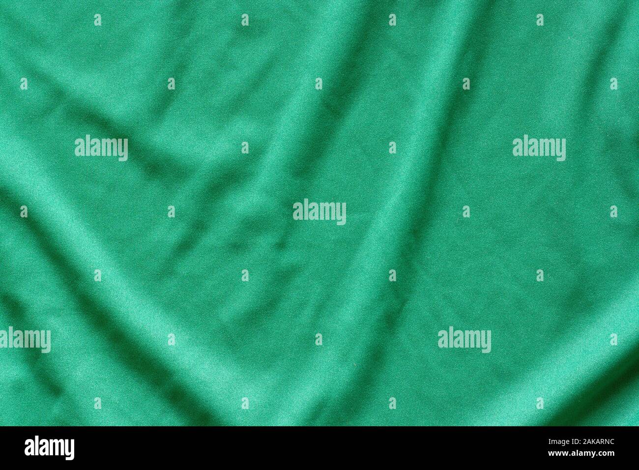 Green fabric texture. The fabric is wavy. The surface is uneven Stock ...