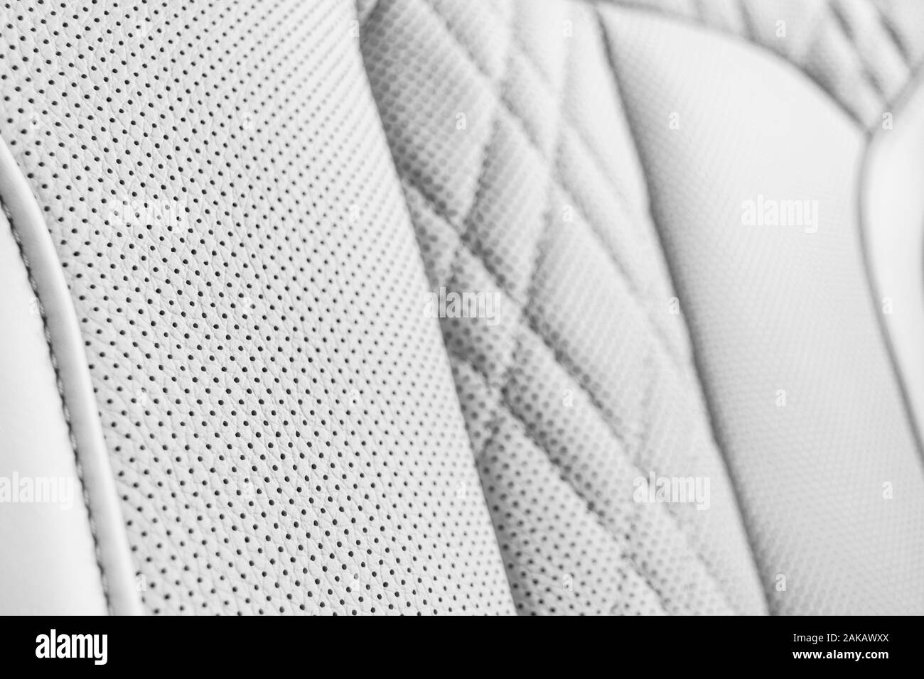 Modern luxury Car white leather interior. Part of perforated leather ...