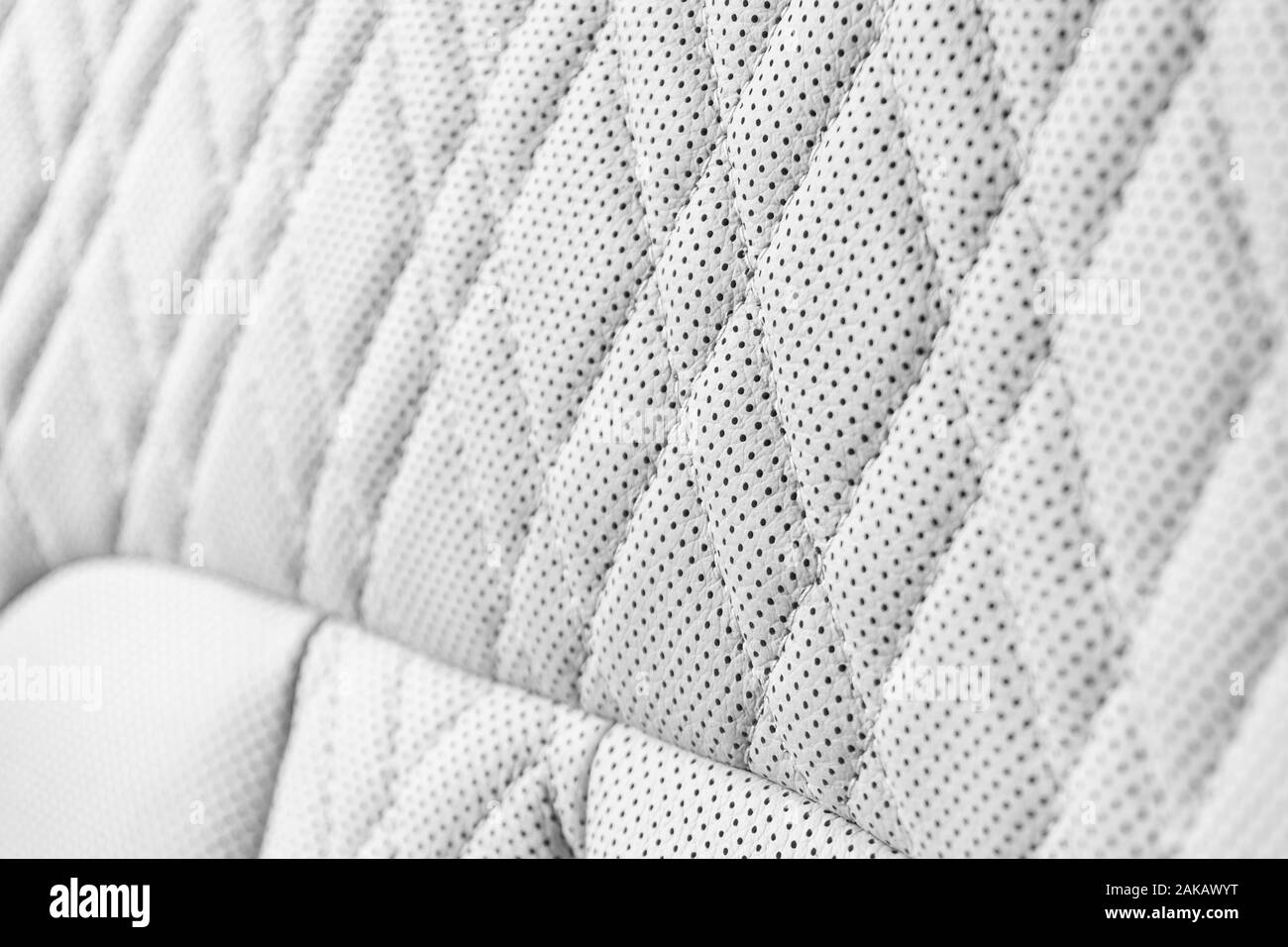 Modern luxury Car white leather interior. Part of perforated leather ...