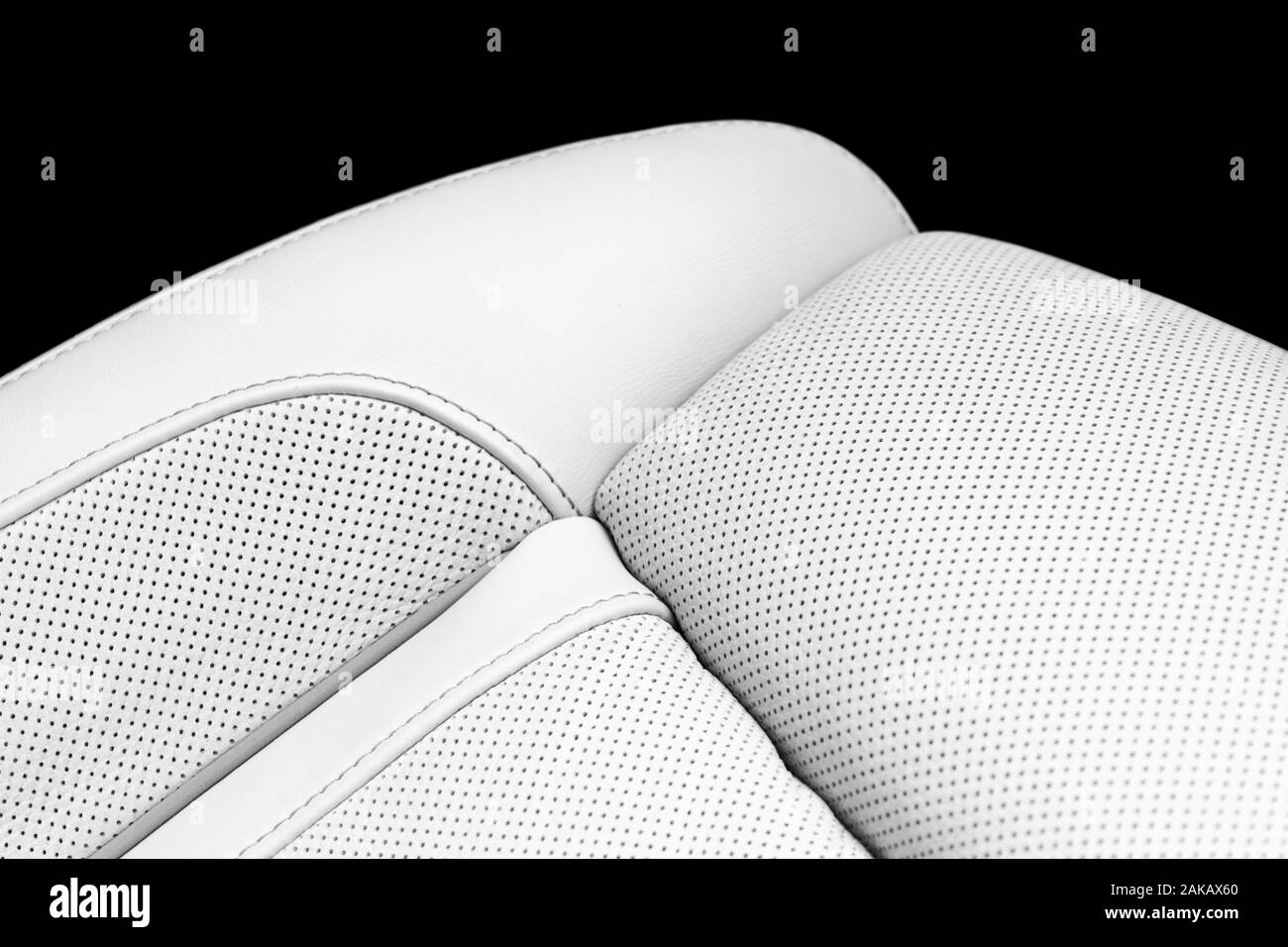 Modern luxury Car white leather interior. Part of perforated leather ...