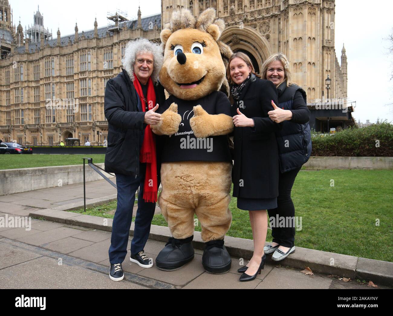 Brian May stands beside Grace the Hedgehog, Anne Brummer CEO of the ...