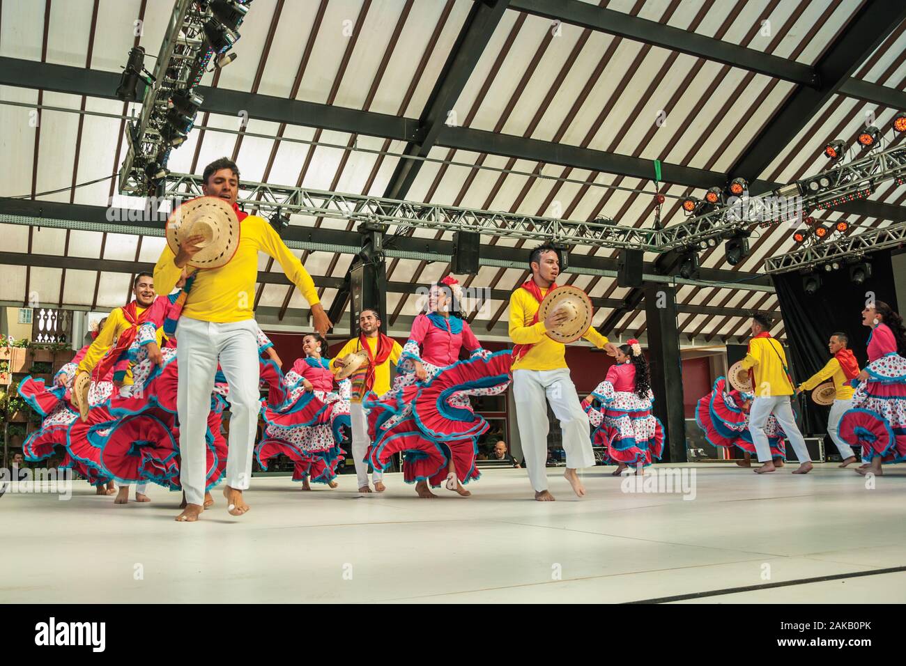 Colombian folk dancers performing a typical dance on Folkloric Festival ...