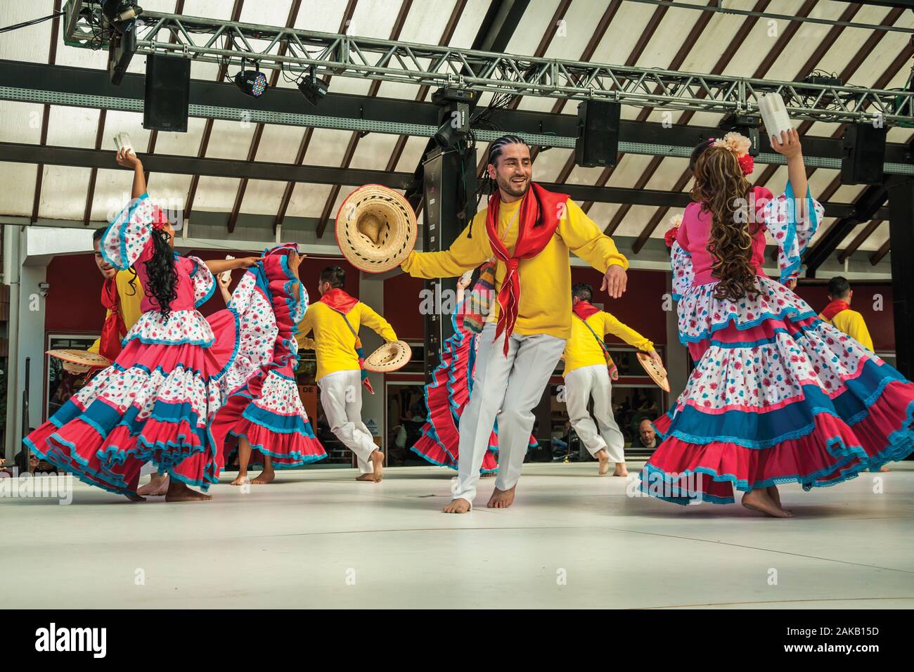 Colombian folk dancers performing a typical dance on Folkloric Festival ...