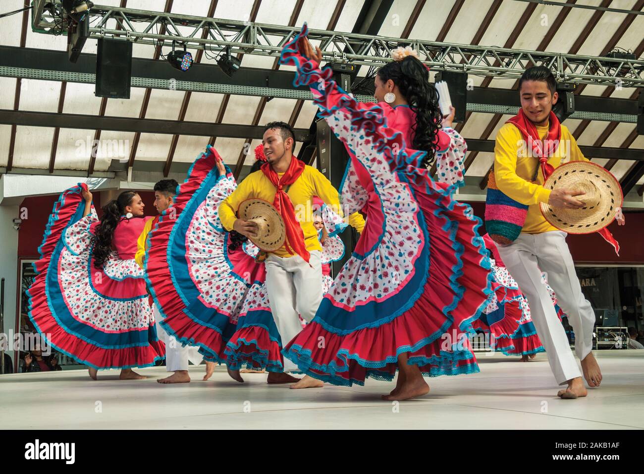 Colombian folk dancers performing a typical dance on Folkloric Festival ...