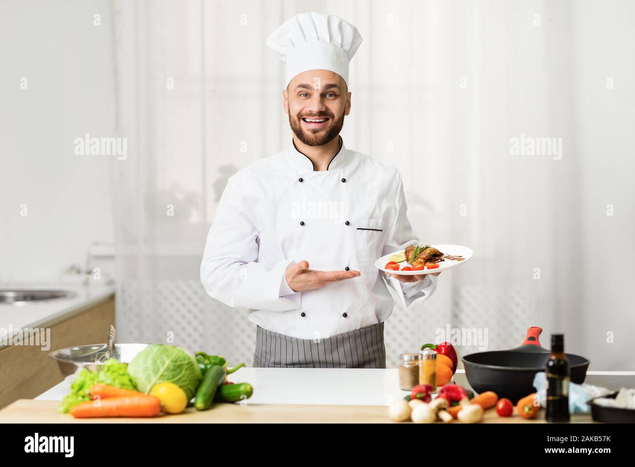 Chef Serving Food. Happy Cook Man Holding Plate With Chicken Presenting ...