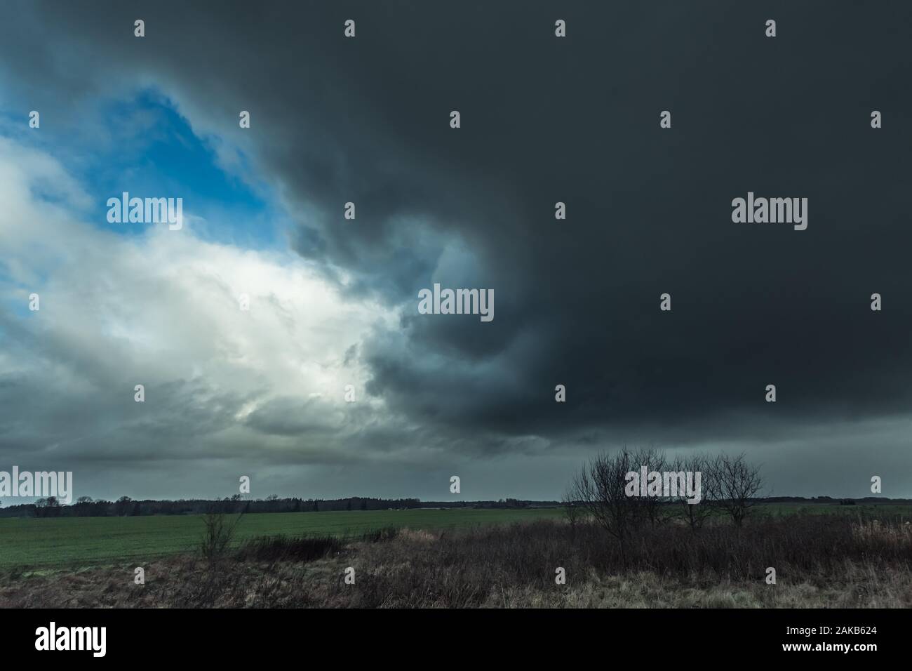 Dark torm clouds background landscape image Stock Photo - Alamy