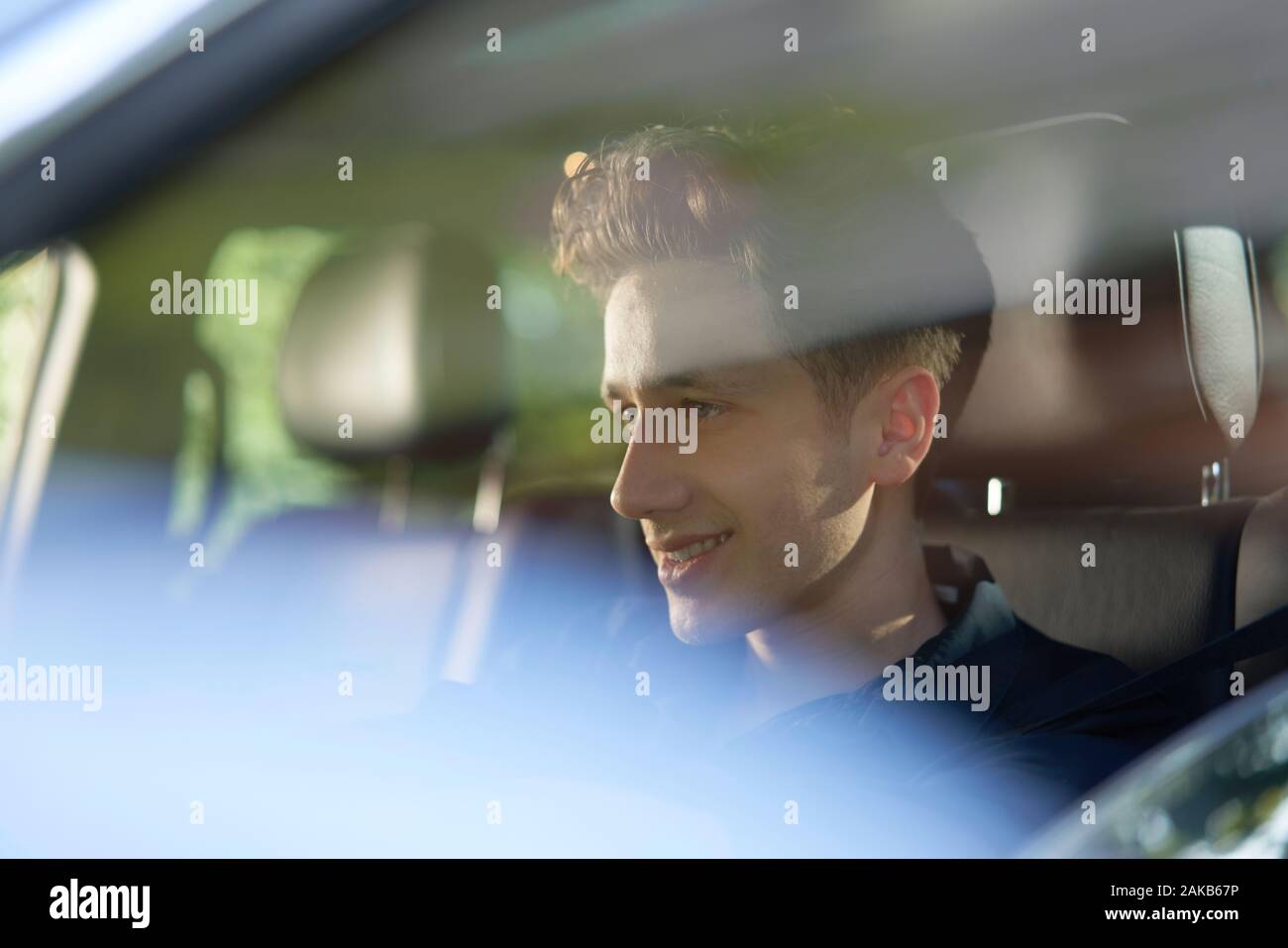 Driver smile car window hi-res stock photography and images - Alamy