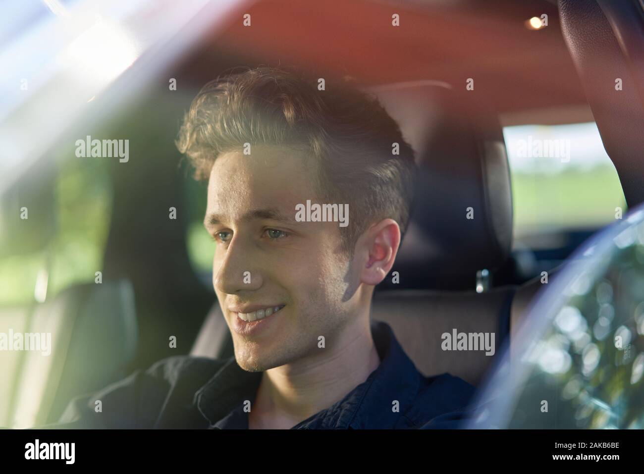Driver smile car window hi-res stock photography and images - Alamy
