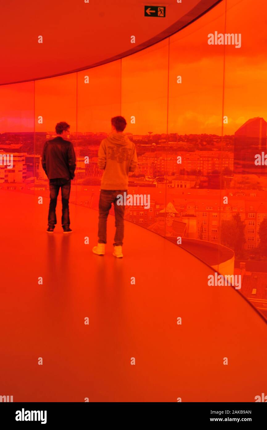 City view of Århus, Denmark. Photo taken through orange glass in the ...