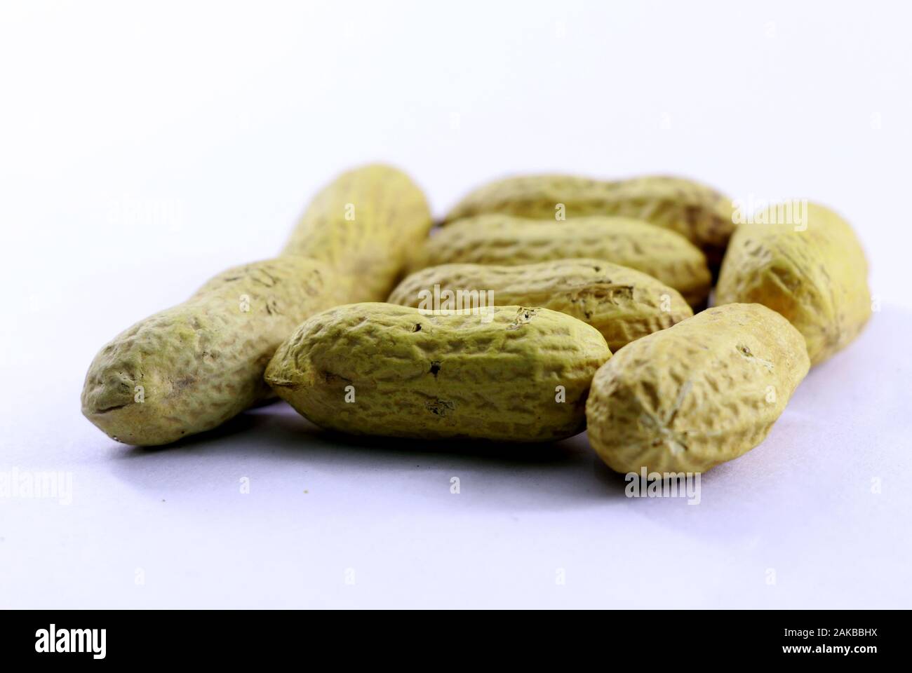 penuts isolated on a white background Stock Photo - Alamy