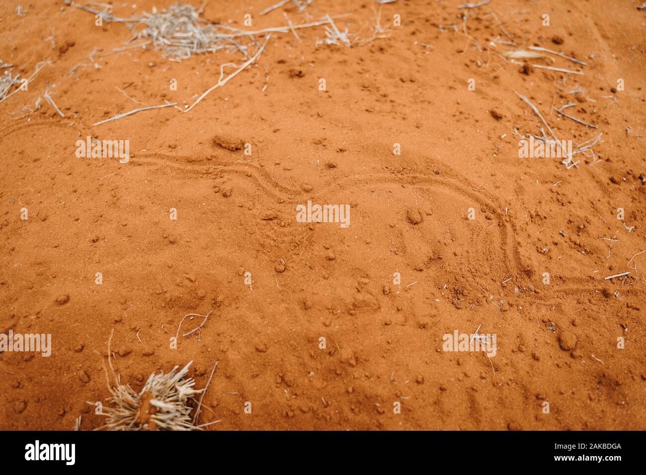 texture of red sand with structures and small stones Stock Photo - Alamy