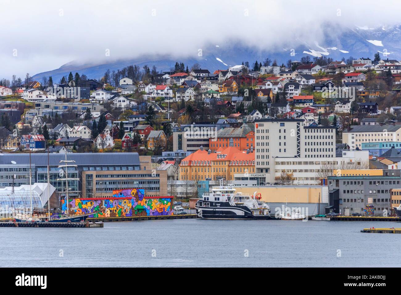 arctic city of tromso, autumn colours , wooden buildings, harbour ...