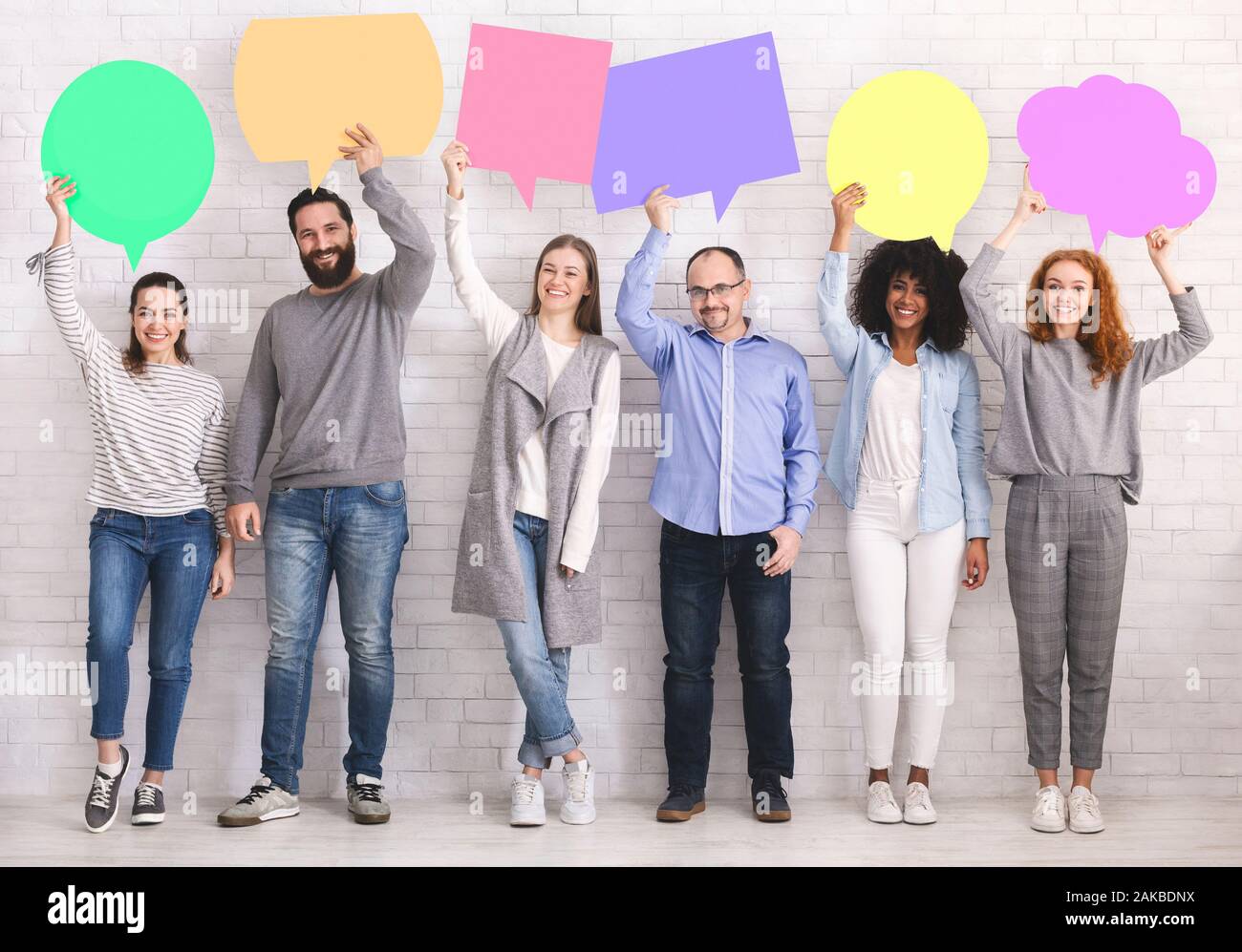 Feedback concept. Diverse people holding colorful speech bubbles, free ...
