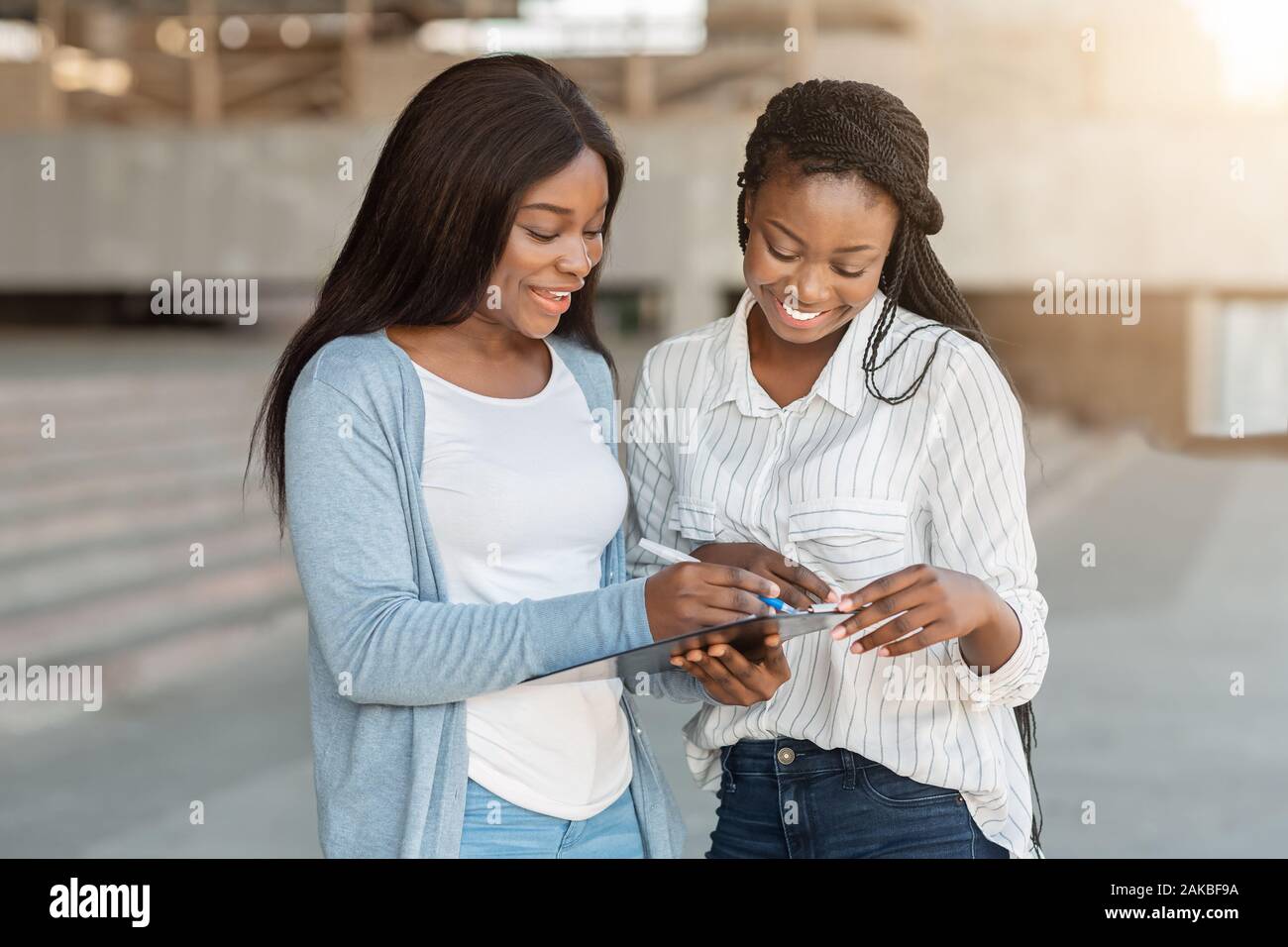 Woman taking survey on the street hi-res stock photography and images ...
