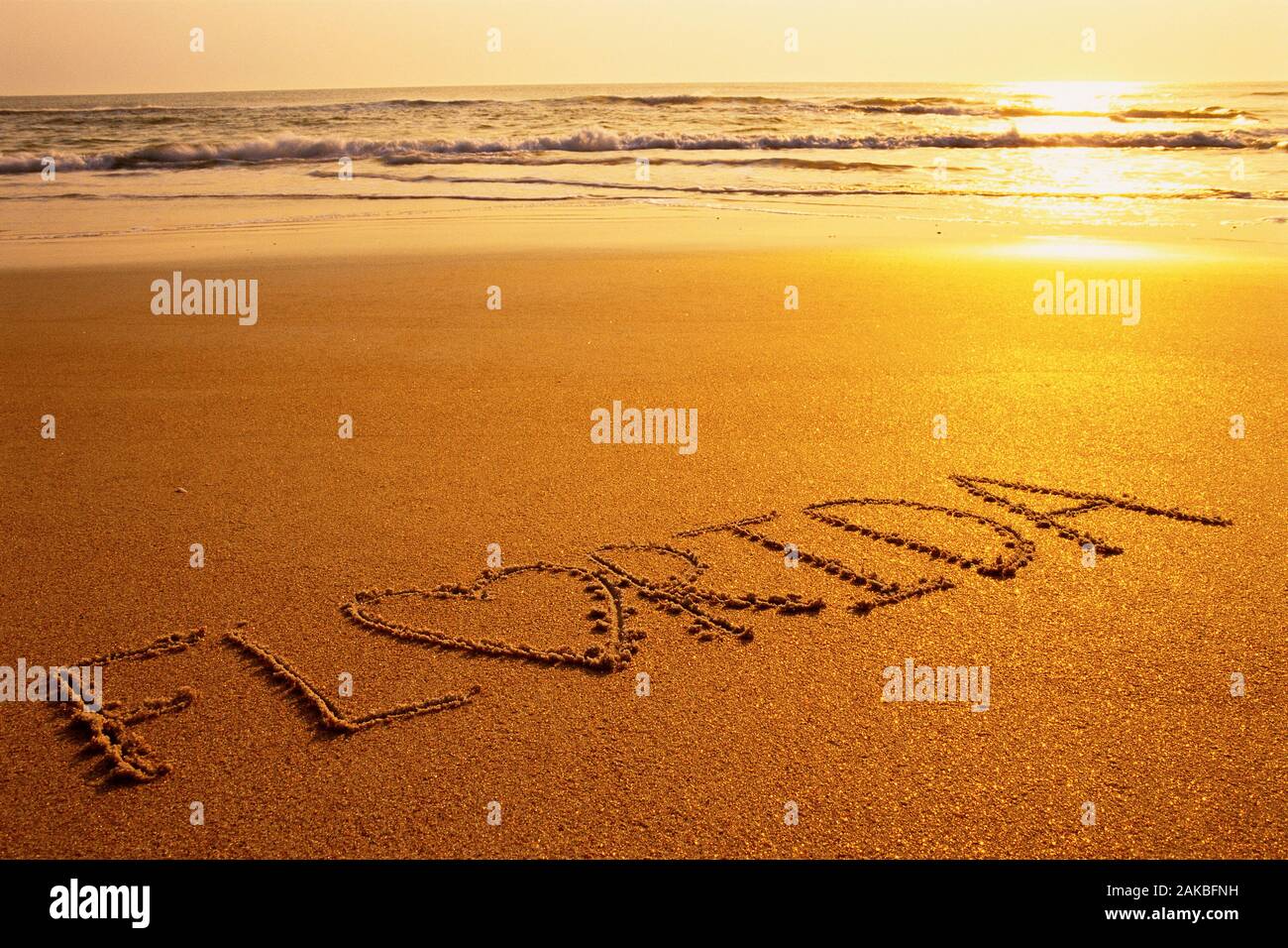 Florida written on beach sand at sunset, Florida, USA Stock Photo - Alamy
