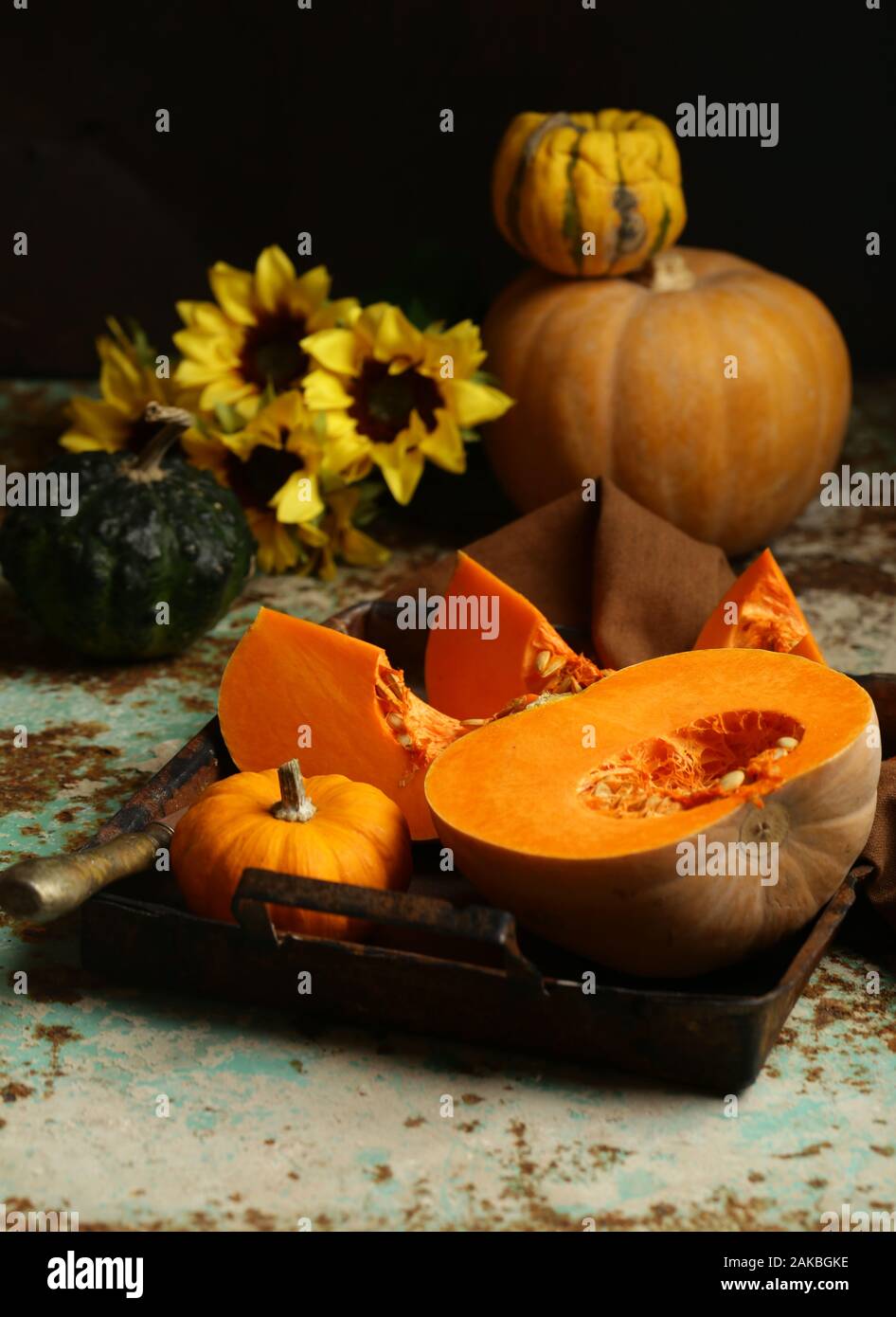 natural organic pumpkins on a rustic table Stock Photo - Alamy