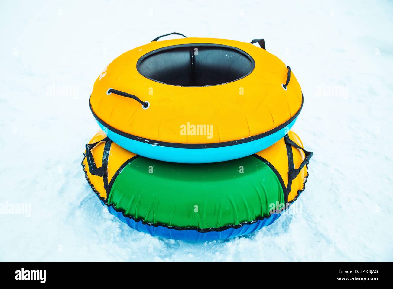 snow tubing rings close up. hill on background Stock Photo - Alamy