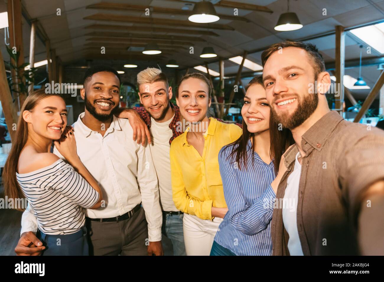 Startup team posing photo in hi-res stock photography and images - Alamy