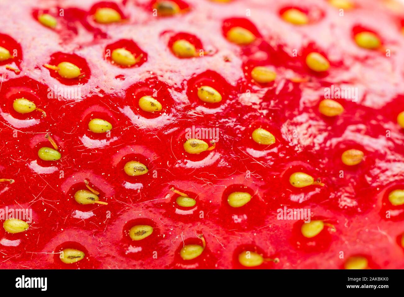 Texture of a strawberry in a close up view Stock Photo - Alamy